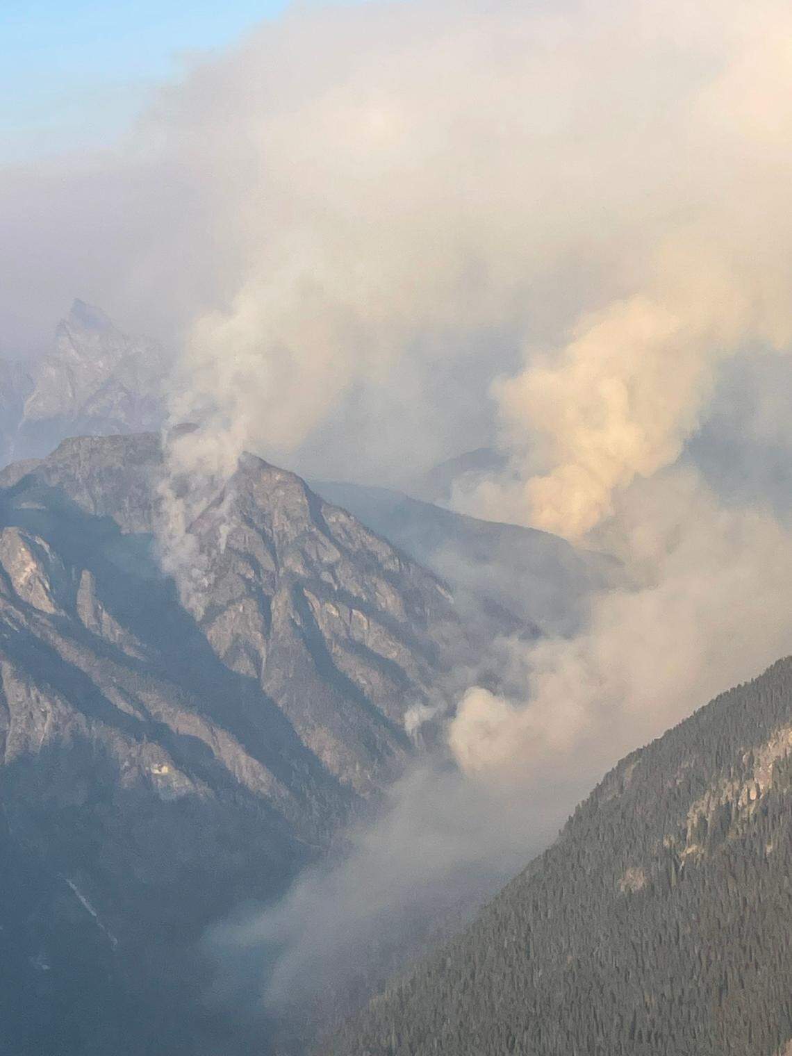 Firefighters protect buildings as air drops continue on Whatcom County ...