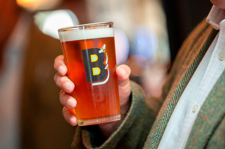 By 'Eck! First pint of cask Boddingtons poured in Manchester after ...