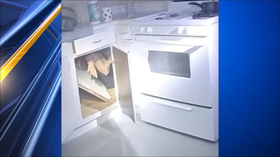 Domestic violence suspect found in hidden compartment