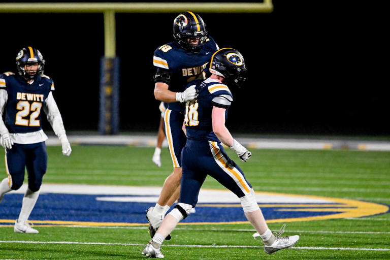 Four downs from DeWitt football fending off Mason in showdown of area ...