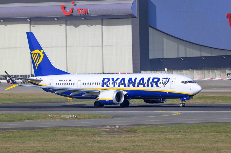 Ryanair flight grounded as passenger 'tries to open emergency exit' in ...