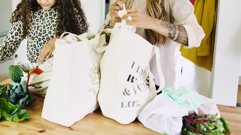 Fold Your Reusable Shopping Bags Like A Pro To Save Tons Of Space