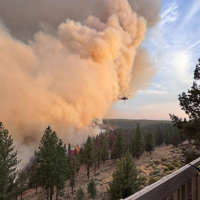 Firefighter dies battling 1 of multiple wildfires in the West