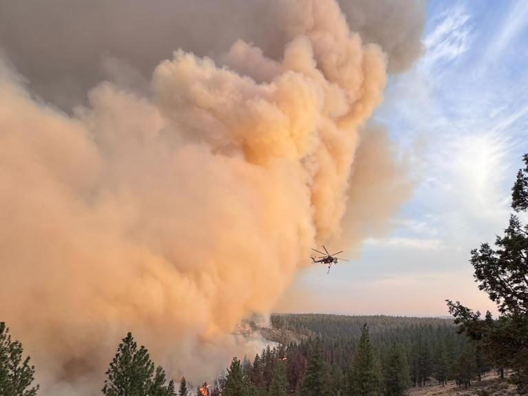 Firefighter dies battling 1 of multiple wildfires in the West