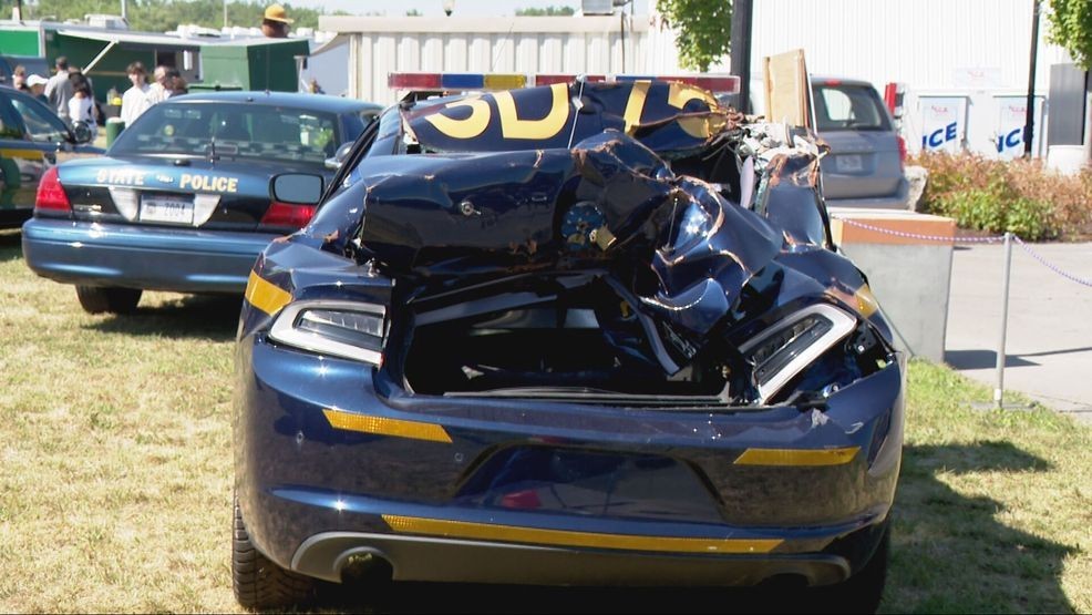 Smashed police vehicle on display at State Fair, trooper recounts the story