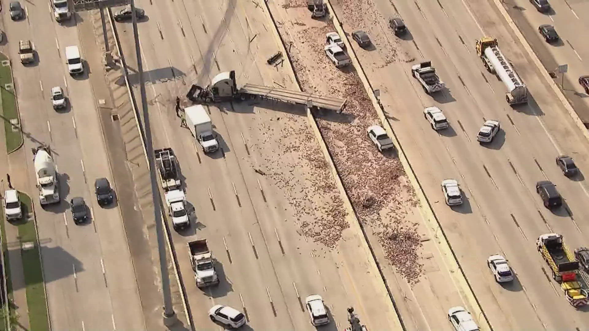 Lost load of bricks causes a chaotic mess on Highway 290