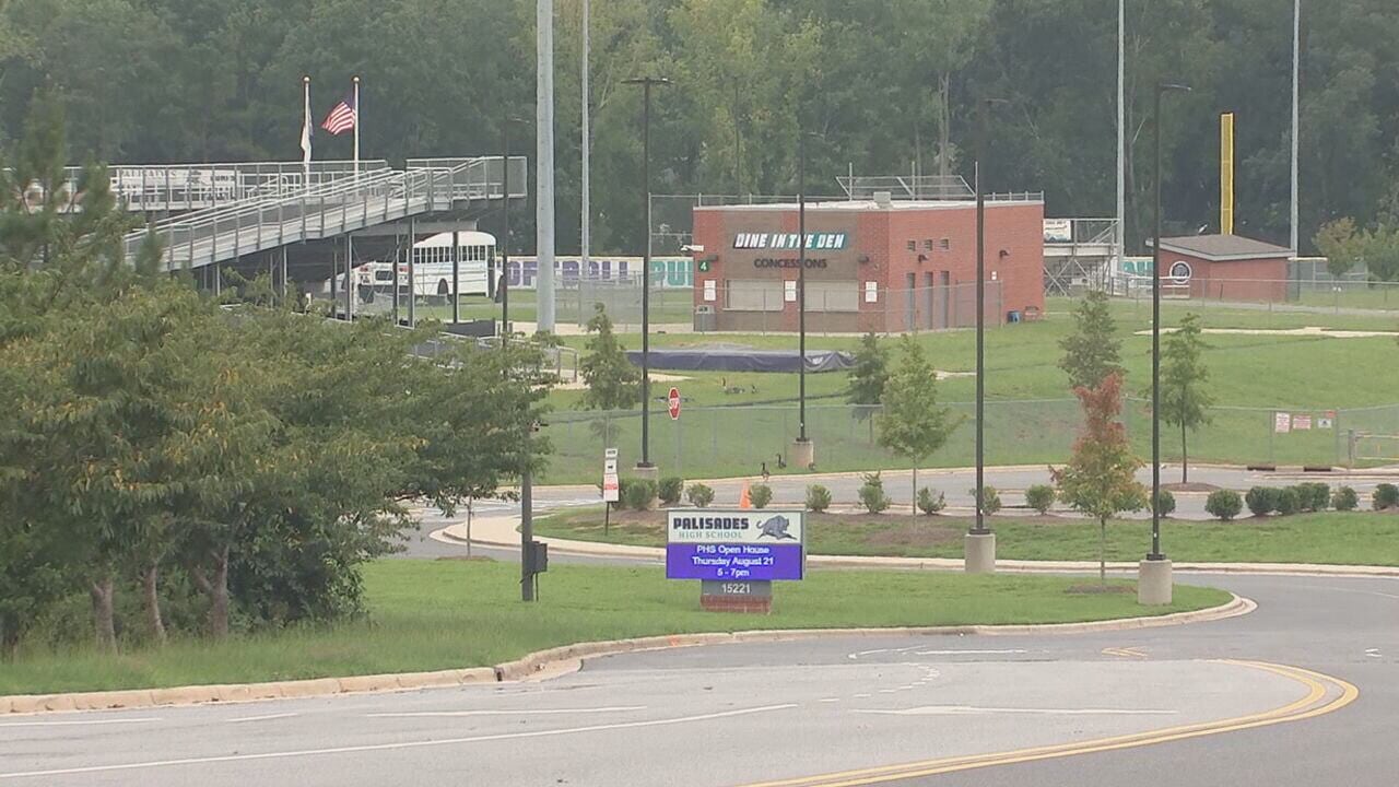 Parents arrested for bringing weapons to campus on first day of school