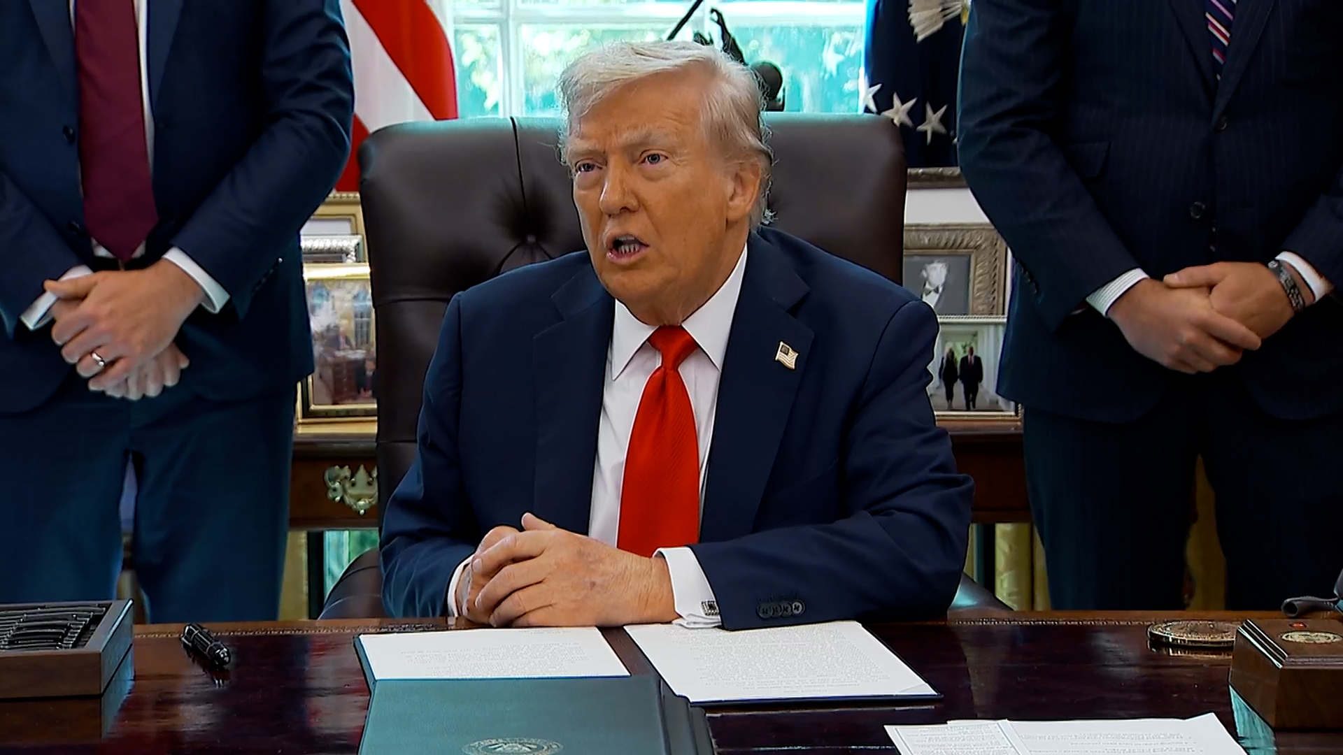 Trump signs order aimed at ending flag burning