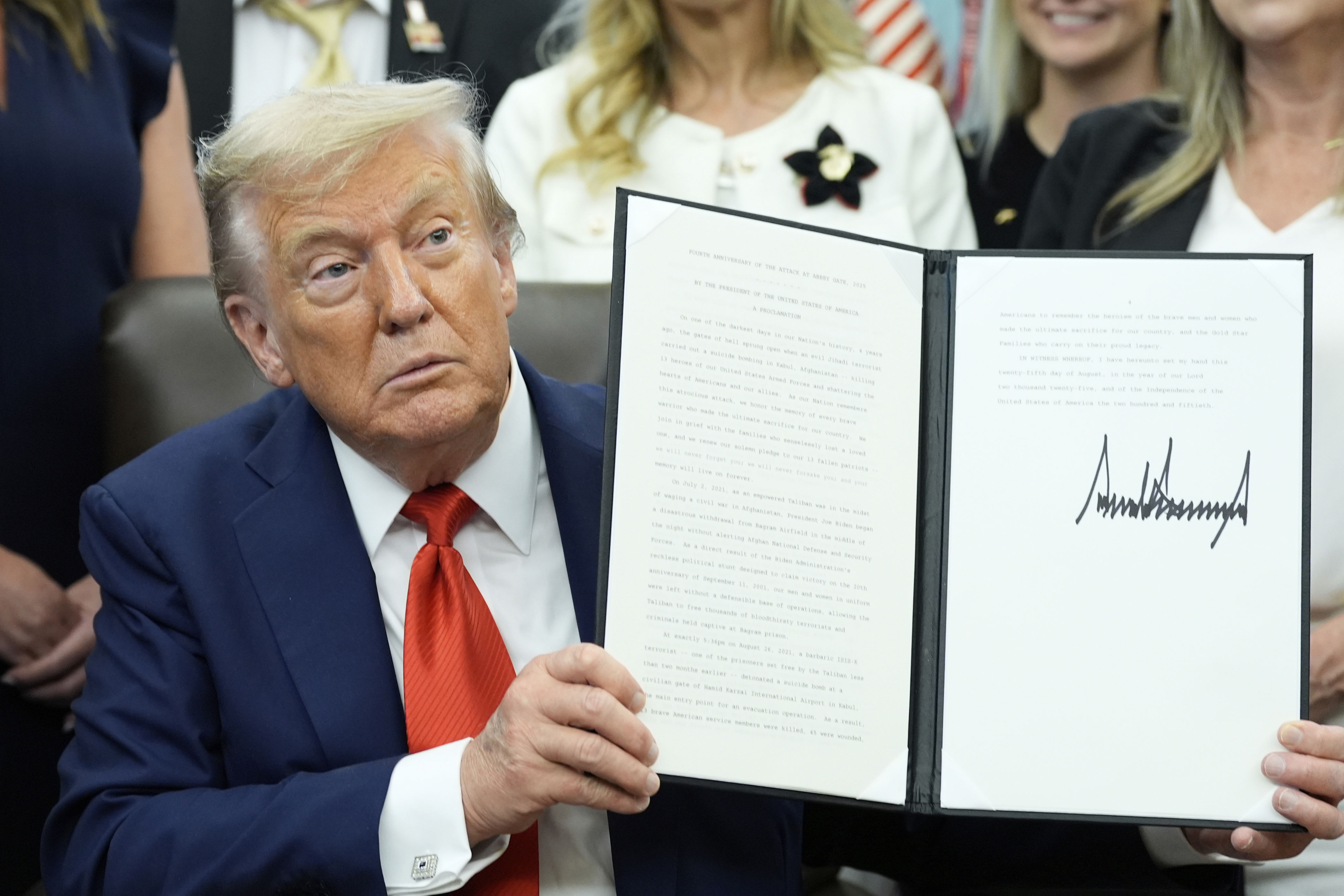 Trump moves to oust Fed's Lisa Cook, who says she 'will not resign'