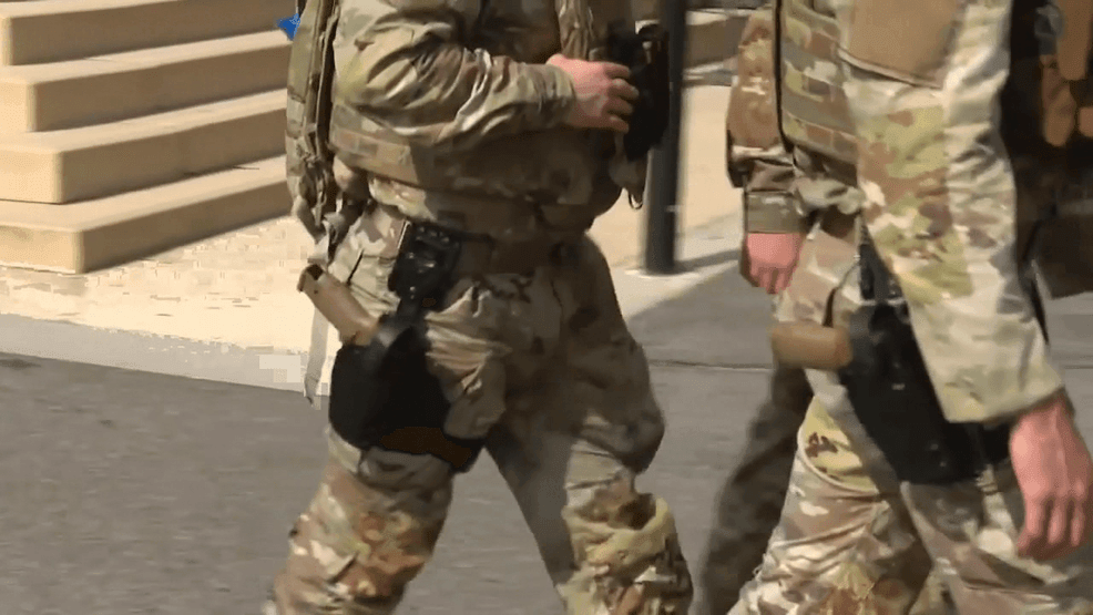 Some National Guard troops armed as federal operation in DC continues