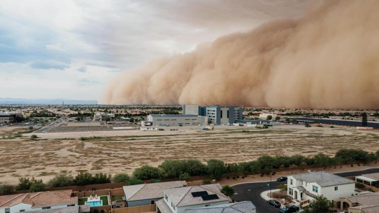 Downpour of rain follows massive dust storm