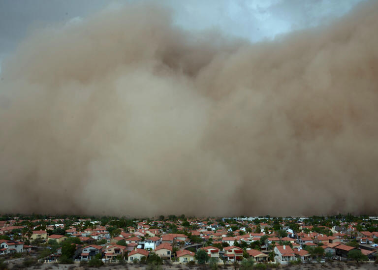 Dust storm darkens skies and blinds drivers in Arizona