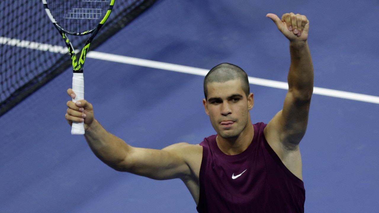 US Open: Buzz cut Alcaraz powers himself into 2nd round with straight ...