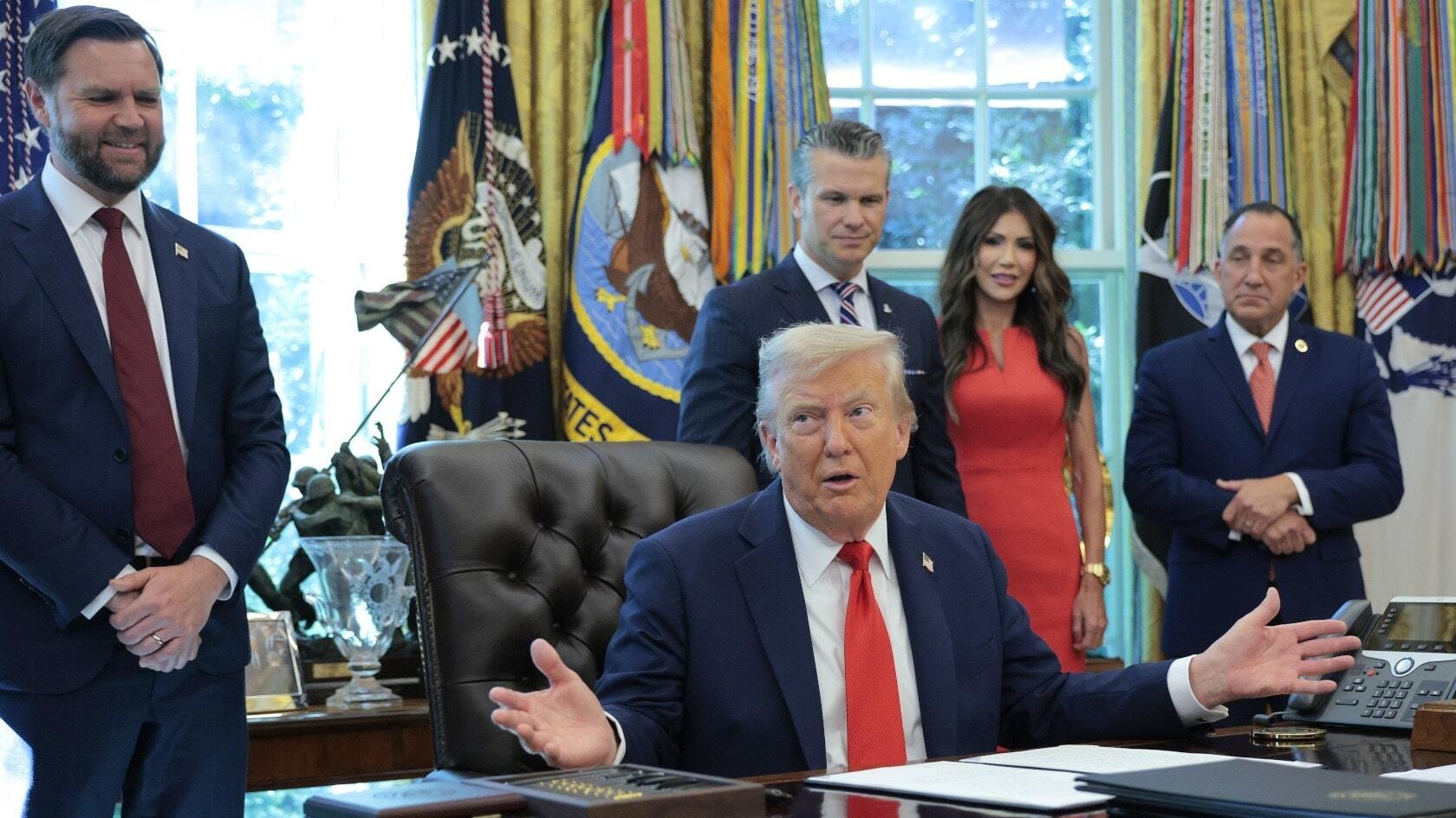 Trump signs new executive orders on no-bail release and flag desecration