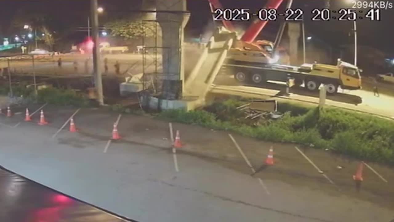 Pedestrian bridge collapses at construction site in Thailand