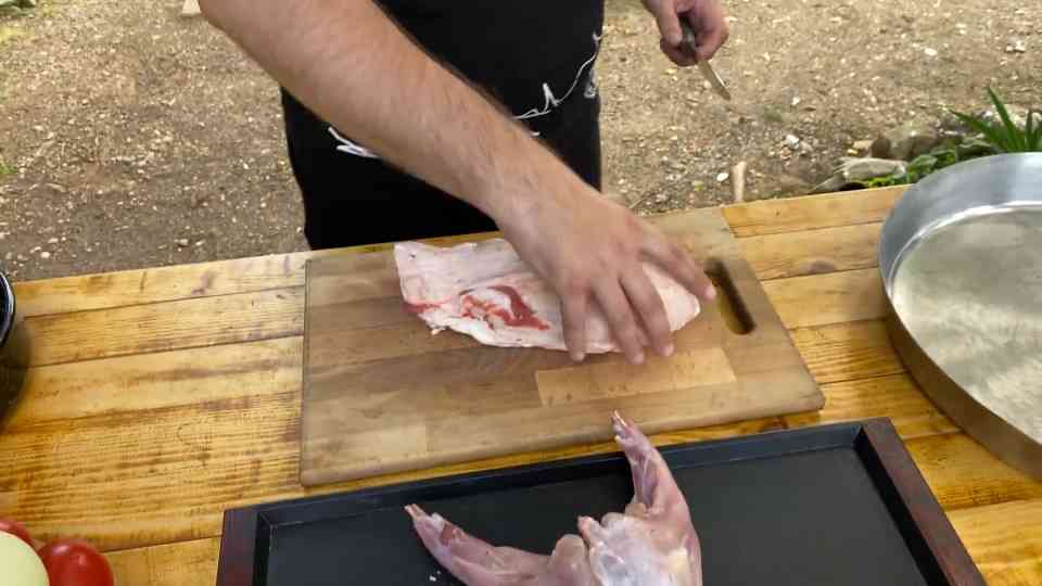 Cooking rabbit meat the traditional way with tomato sauce