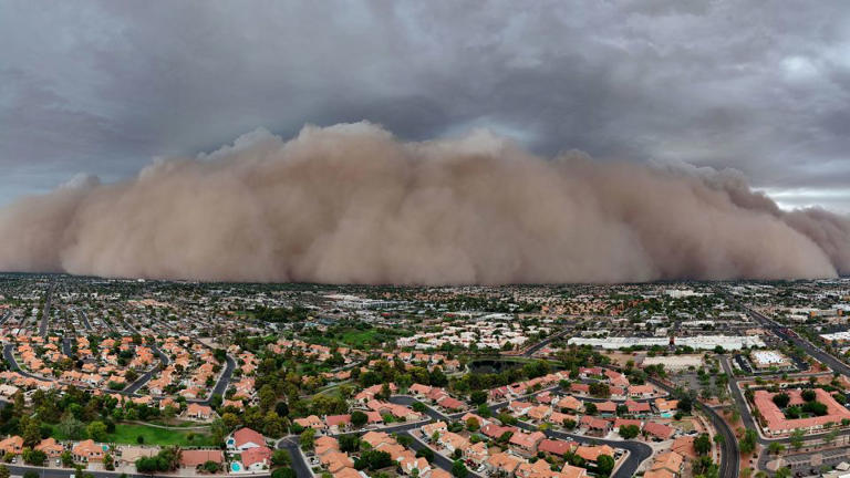 Haboob slams Phoenix with a towering wall of dust, causing damage ...