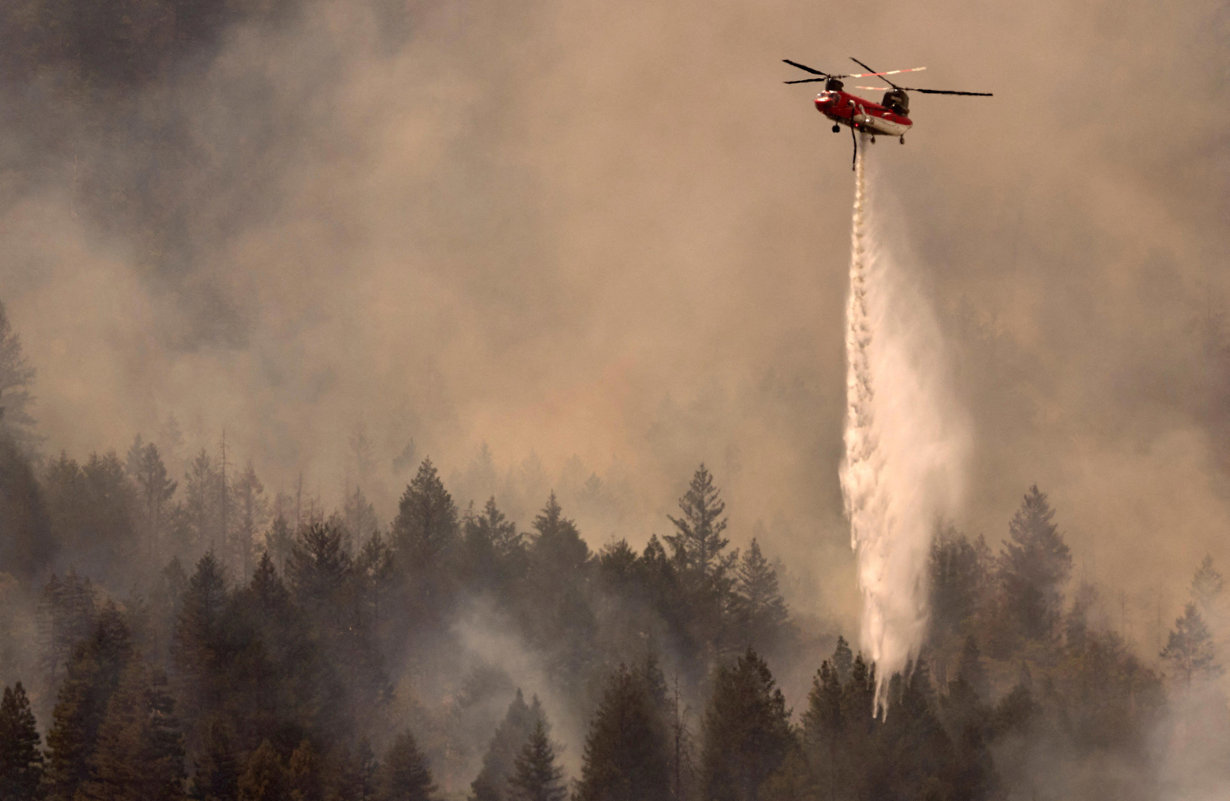 A million acres ablaze in USA; thousands of homes threatened.