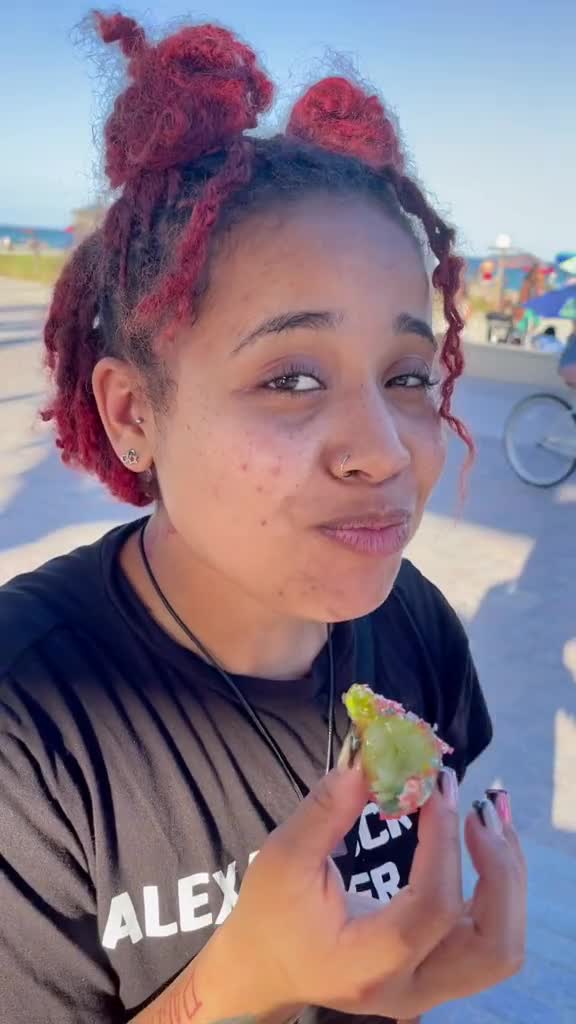 Trying Grape Perk Candy for the First Time on the Beach