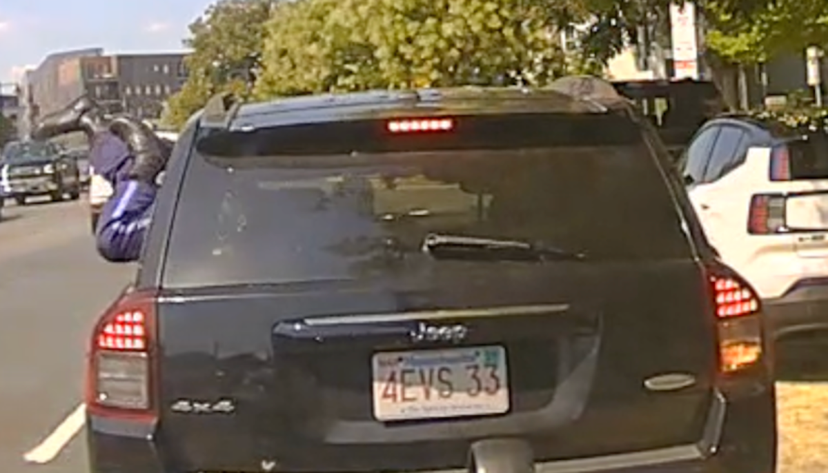 Watch: Trooper dives into car during traffic stop in South Boston