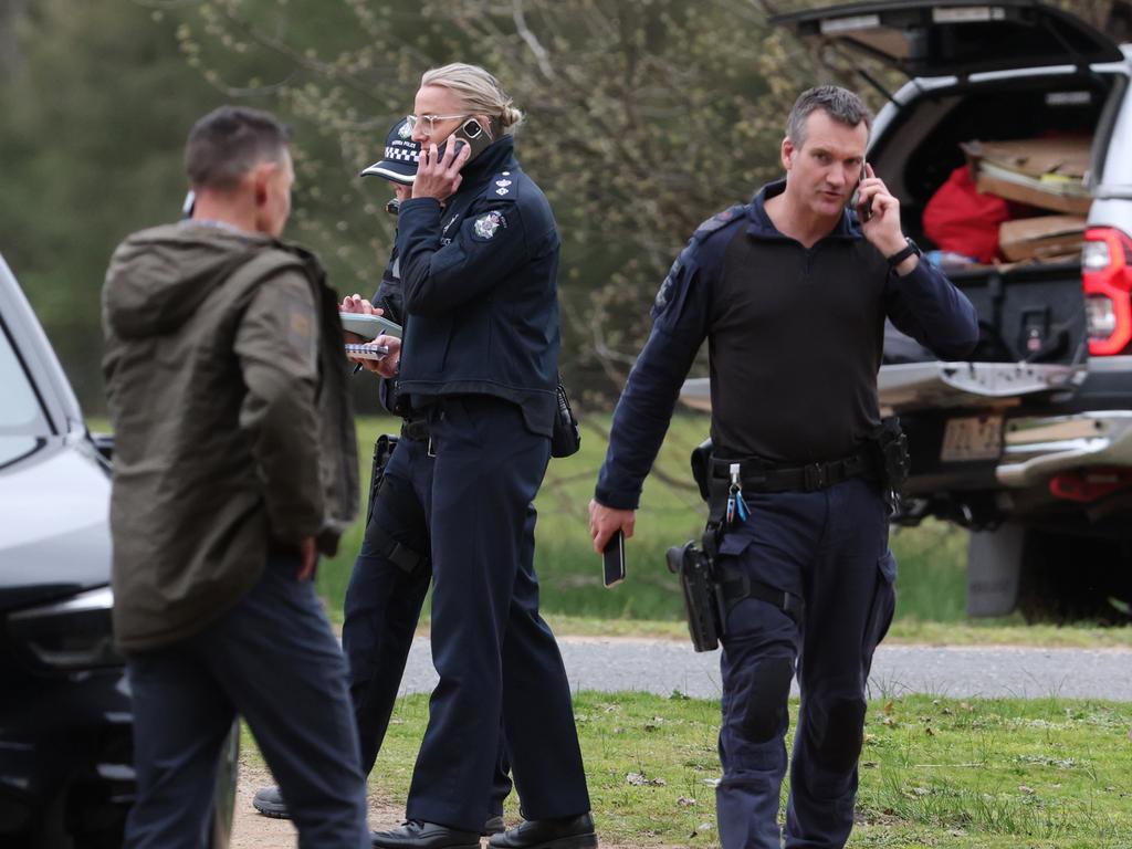 ‘Horrific day’: Manhunt after cops shot dead
