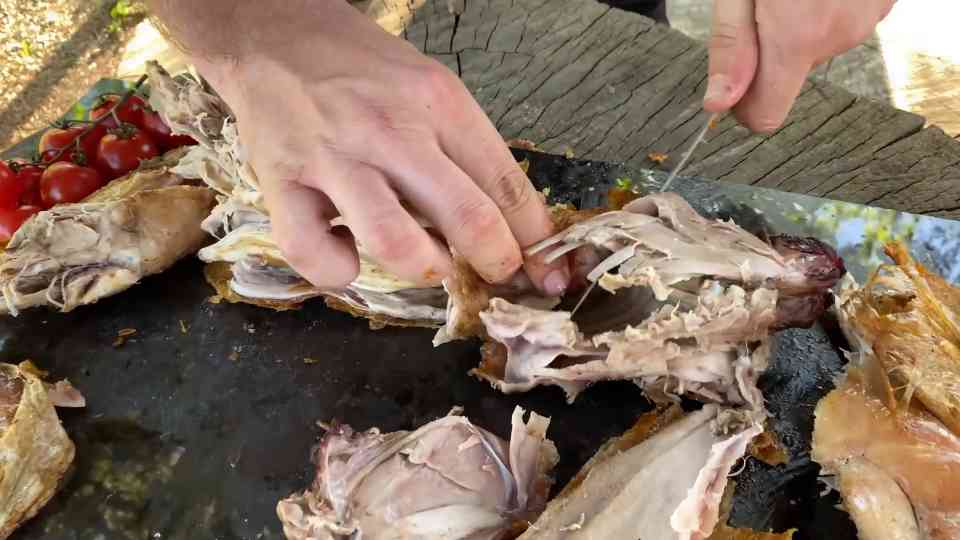 BIG RABBIT SPIT ROASTED IN A TRADITIONAL WAY