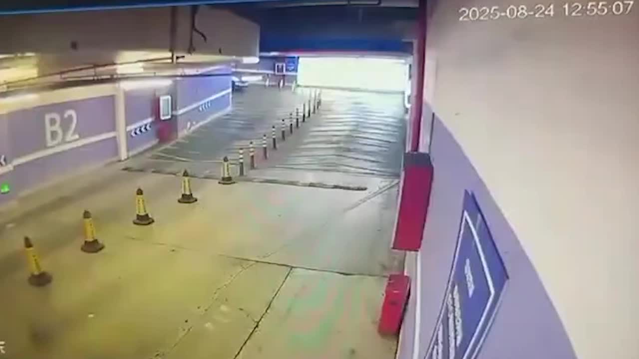 Tesla driver crashes into car park wall