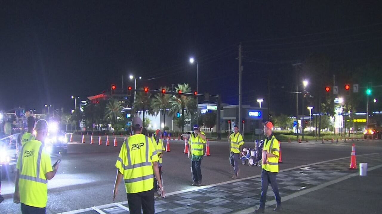 Crews remove checkered flag crosswalk at Daytona International Speedway