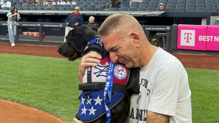 LI Marine veteran surprised with service dog at Yankees game