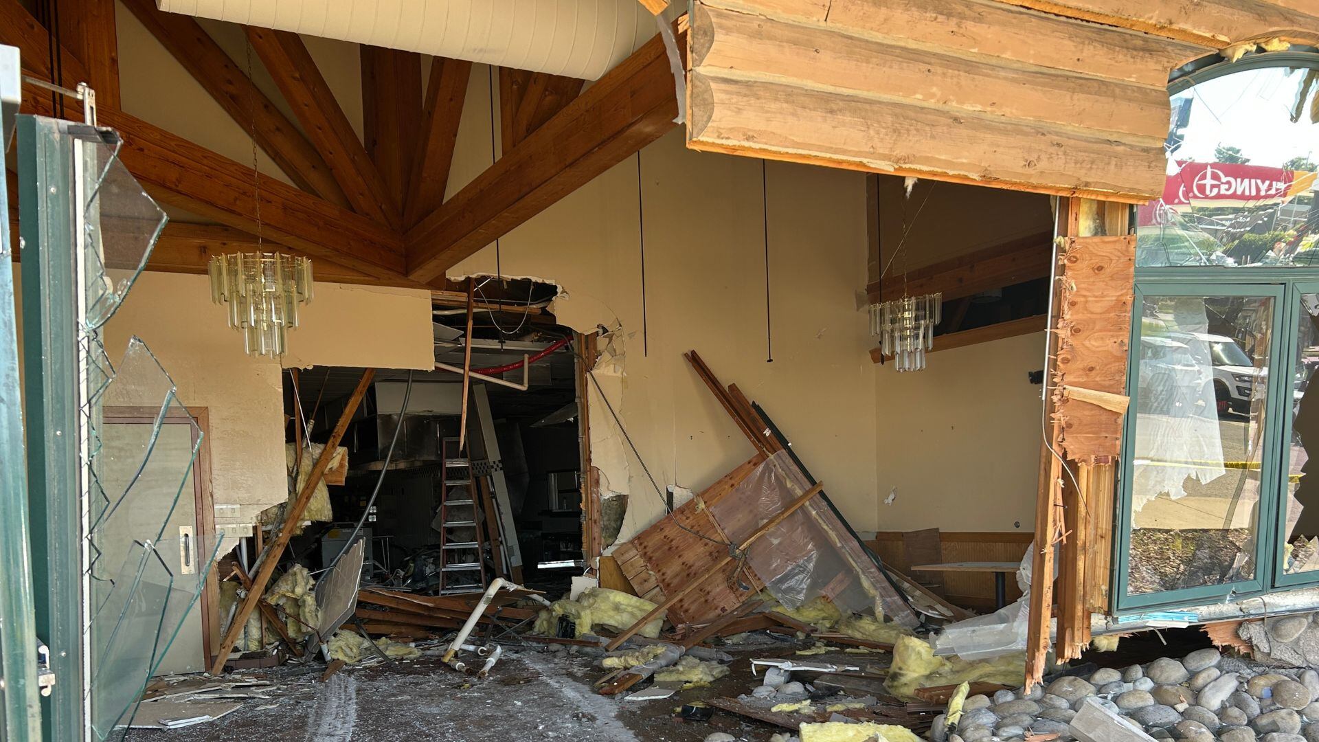 Vehicle crashes into travel center building in Jackson County