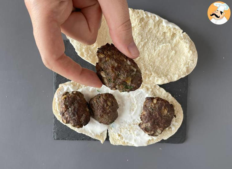 Turkish köfte meatball sandwiches in kebab bread