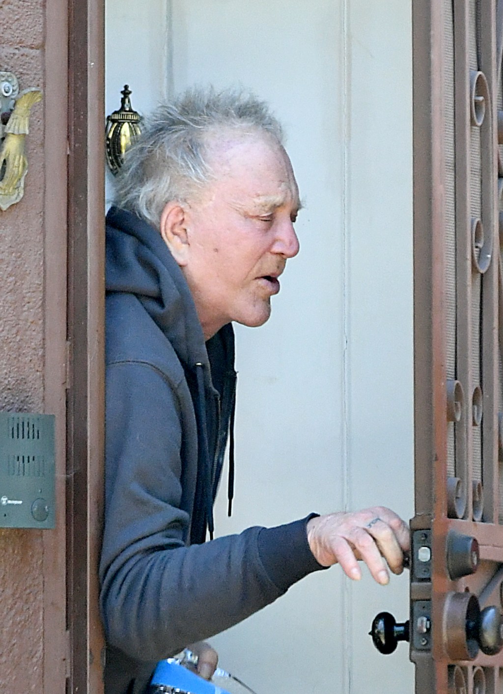 Disheveled Mickey Rourke, 72, spotted in rare outing after scandal in shocking new photos
