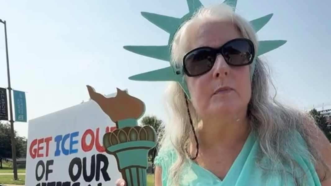 Community members protests ICE recruitment in Arlington