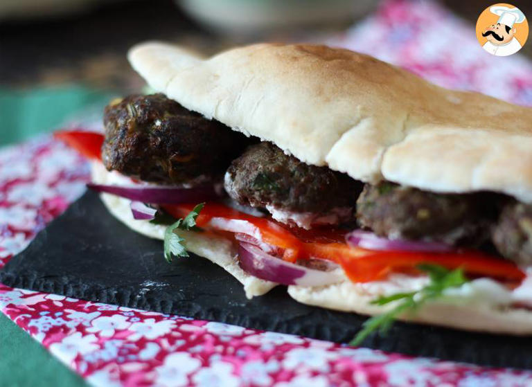Turkish köfte meatball sandwiches in kebab bread