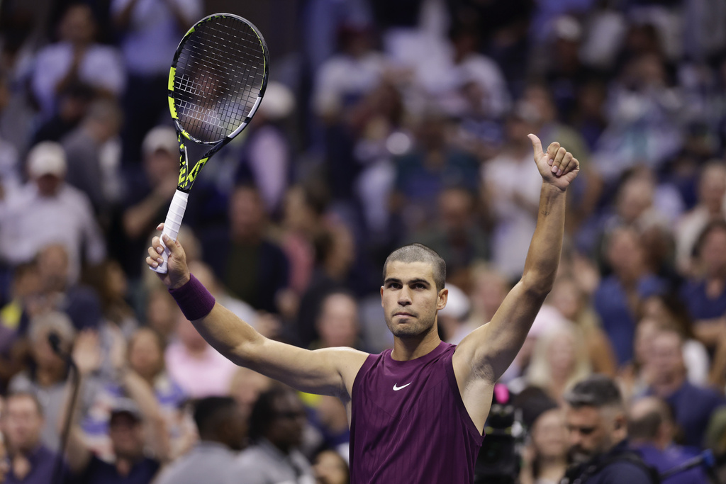 Still sporting his accidental buzz cut, Carlos Alcaraz wins easily at ...
