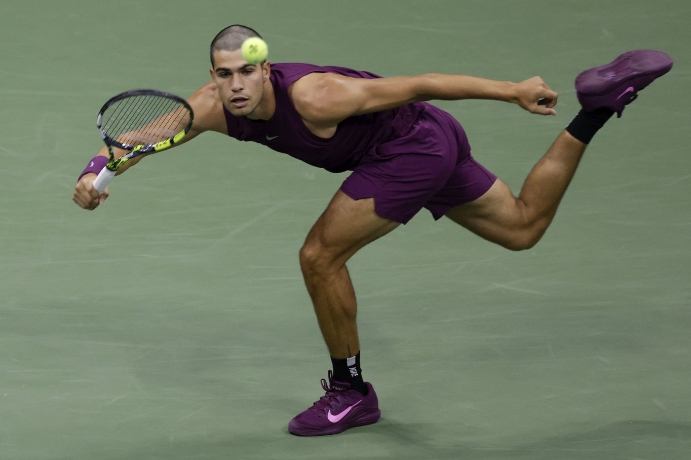 Still sporting his accidental buzz cut, Carlos Alcaraz wins easily at ...