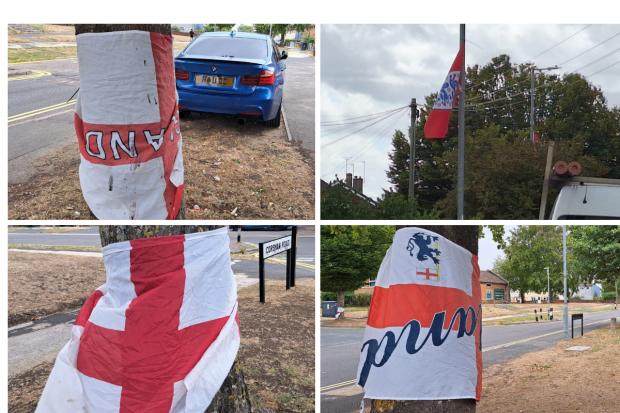'Upside-down flags' appear across town as movement 'defending ...