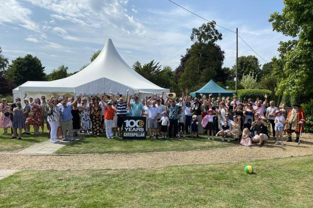 Wimborne company celebrates 25 years with garden party