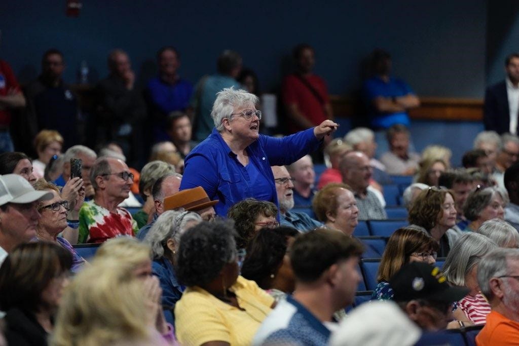 Ohio GOP congressman fields questions amid shouting at a lively town hall