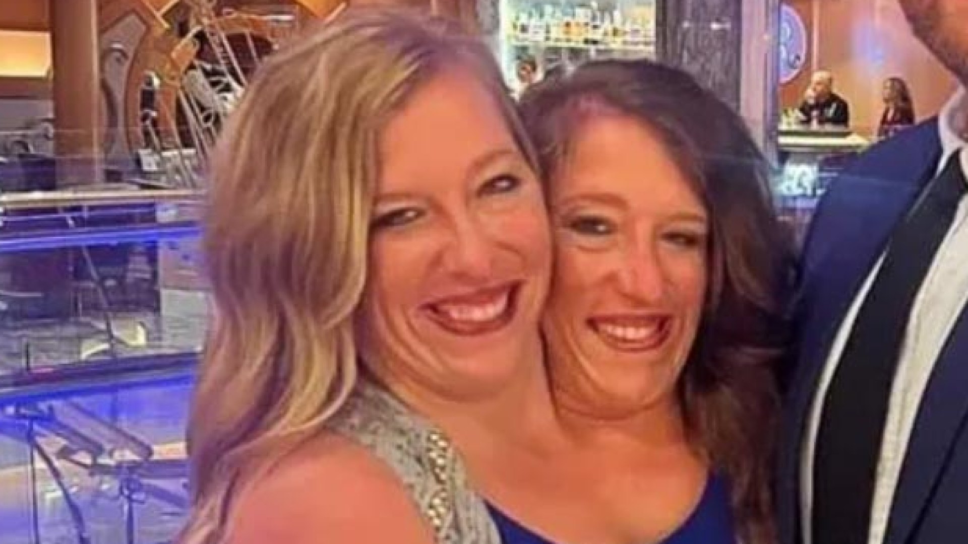 Conjoined Twins Abby and Brittany Run Errands With Dogs After Baby Outing