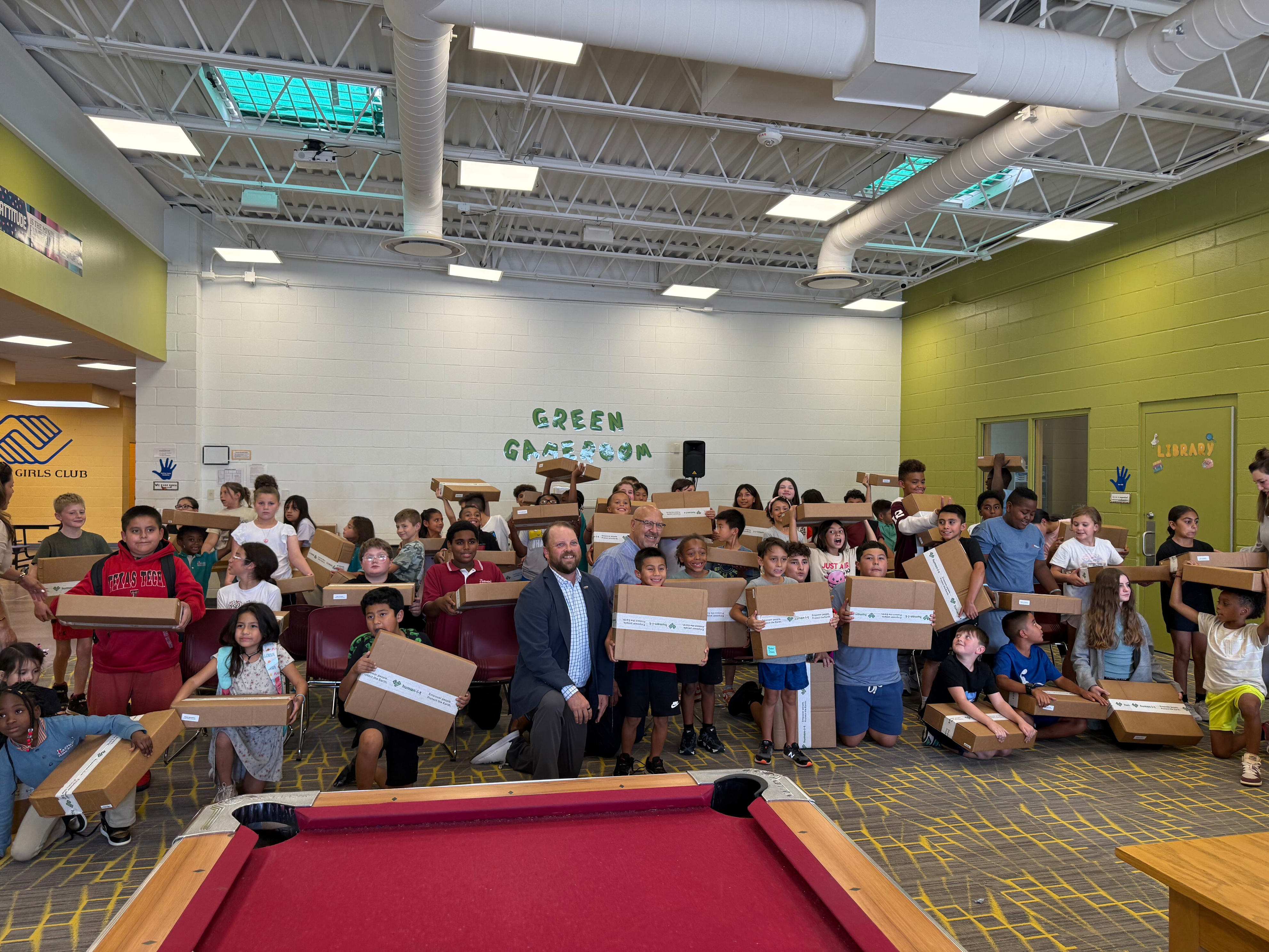 Boys and Girls Club of Lubbock students receive laptops to ‘Bridge the ...