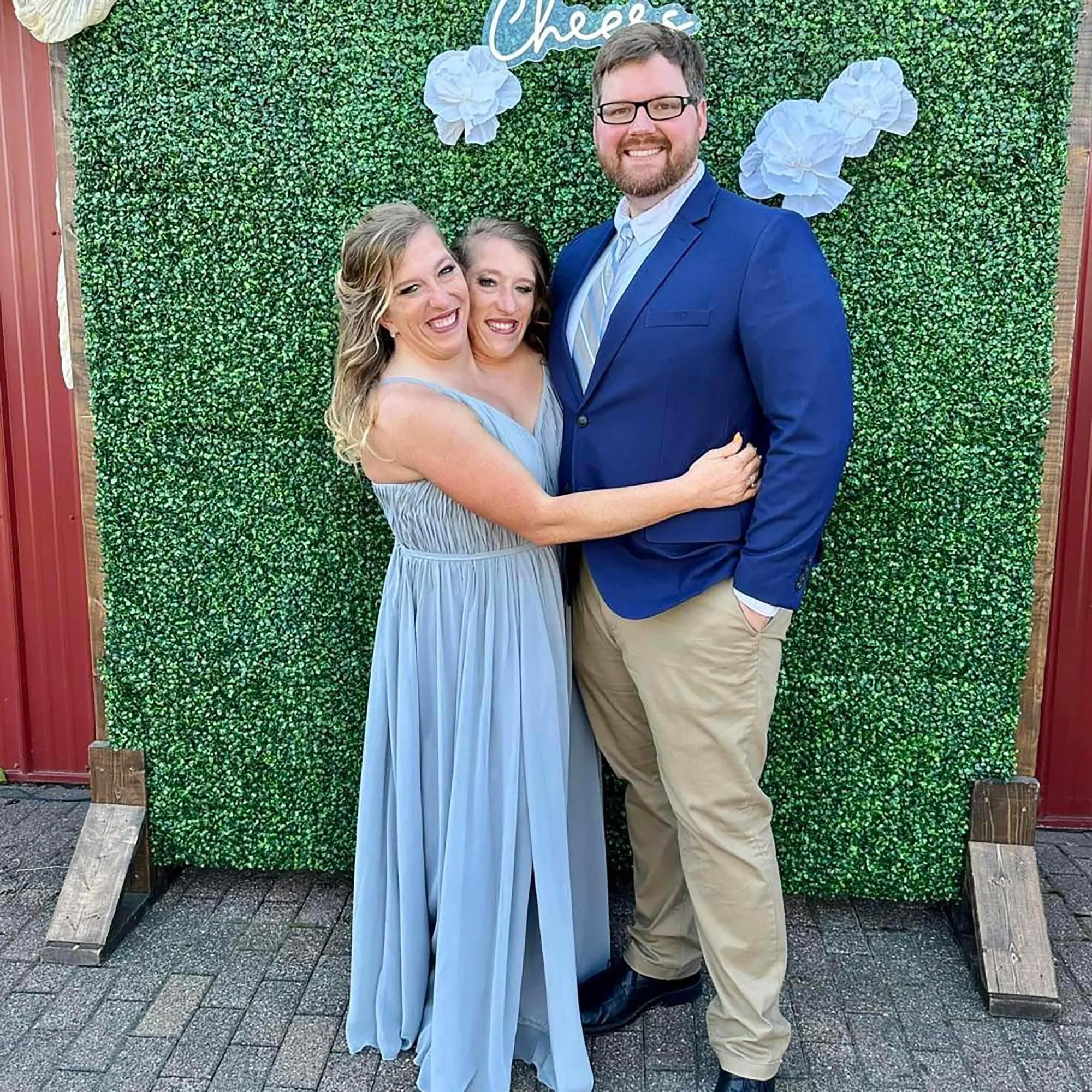 Conjoined Twins Abby and Brittany Run Errands With Dogs After Baby Outing