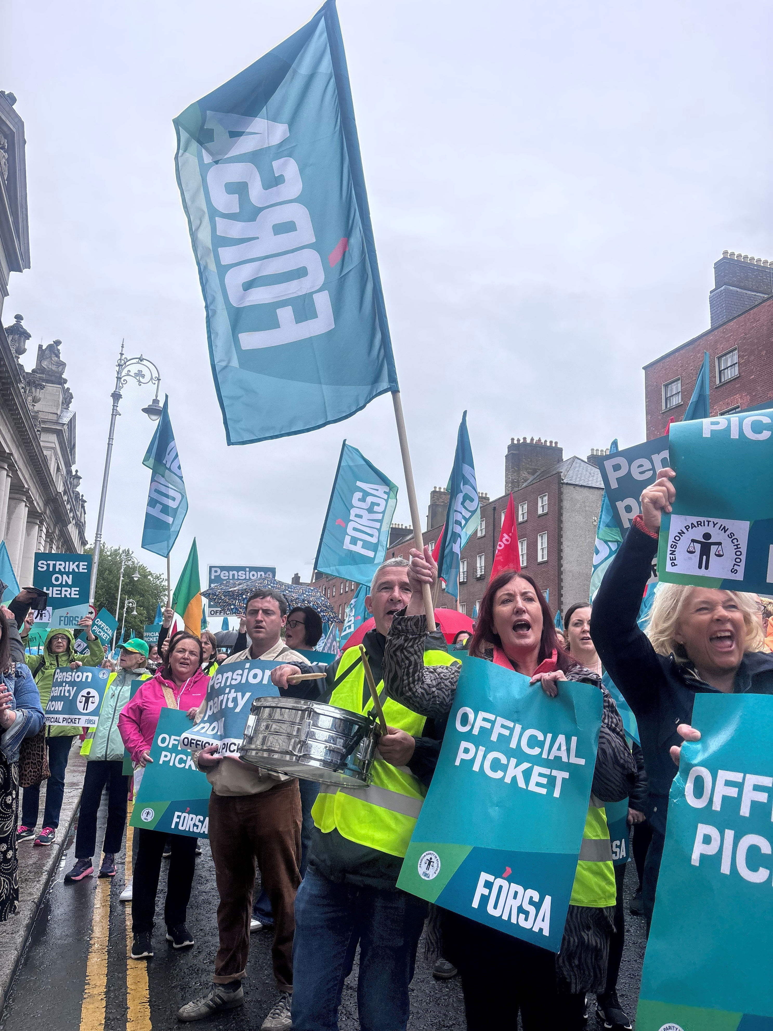School secretaries and caretakers stage strike action