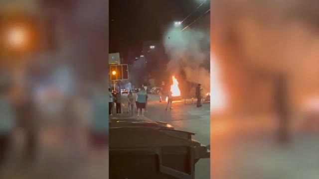 Switzerland riots: Protesters throw fireworks at police after teenager ...