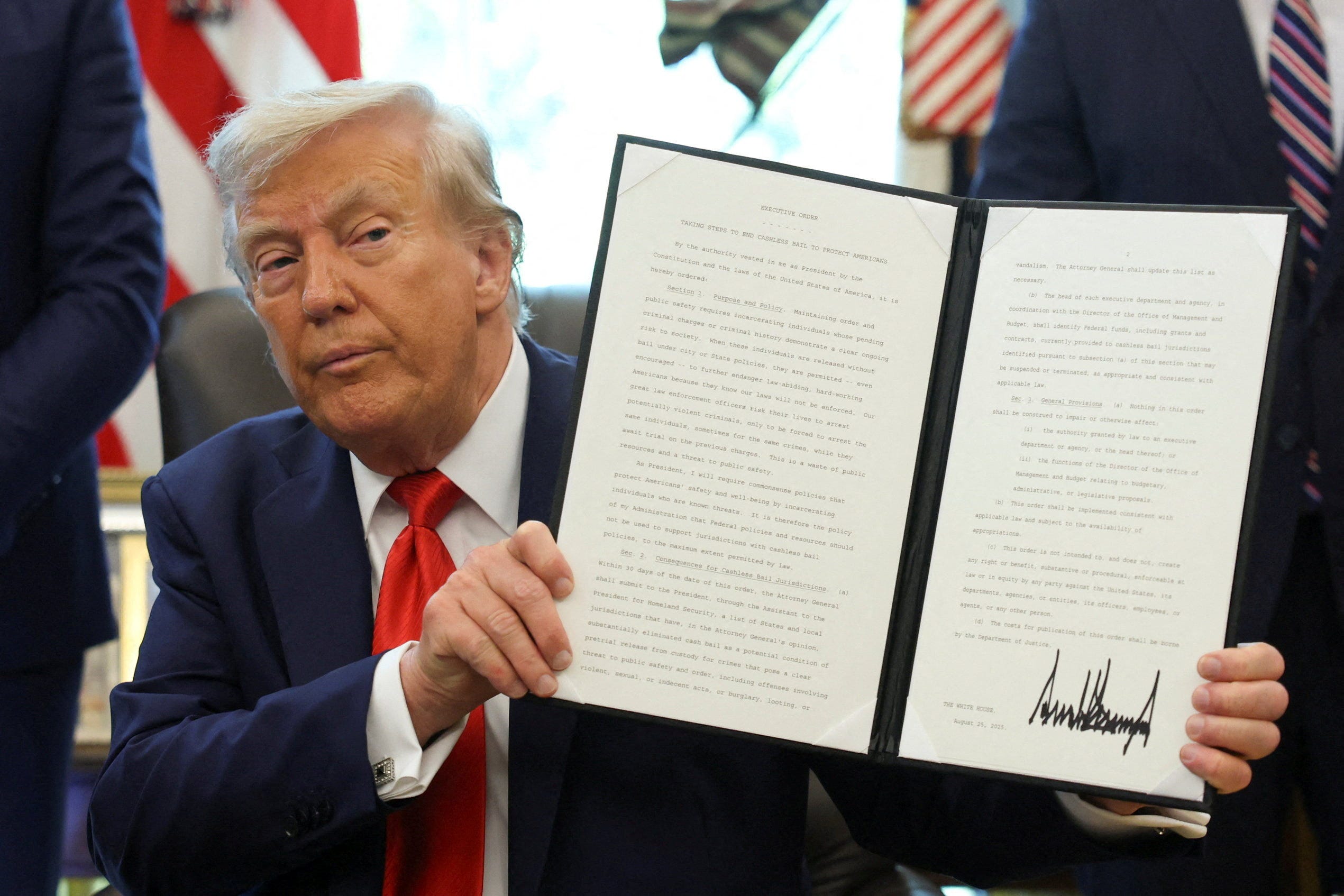 How many executive orders did Trump sign? Flag-burning, cashless bail ...