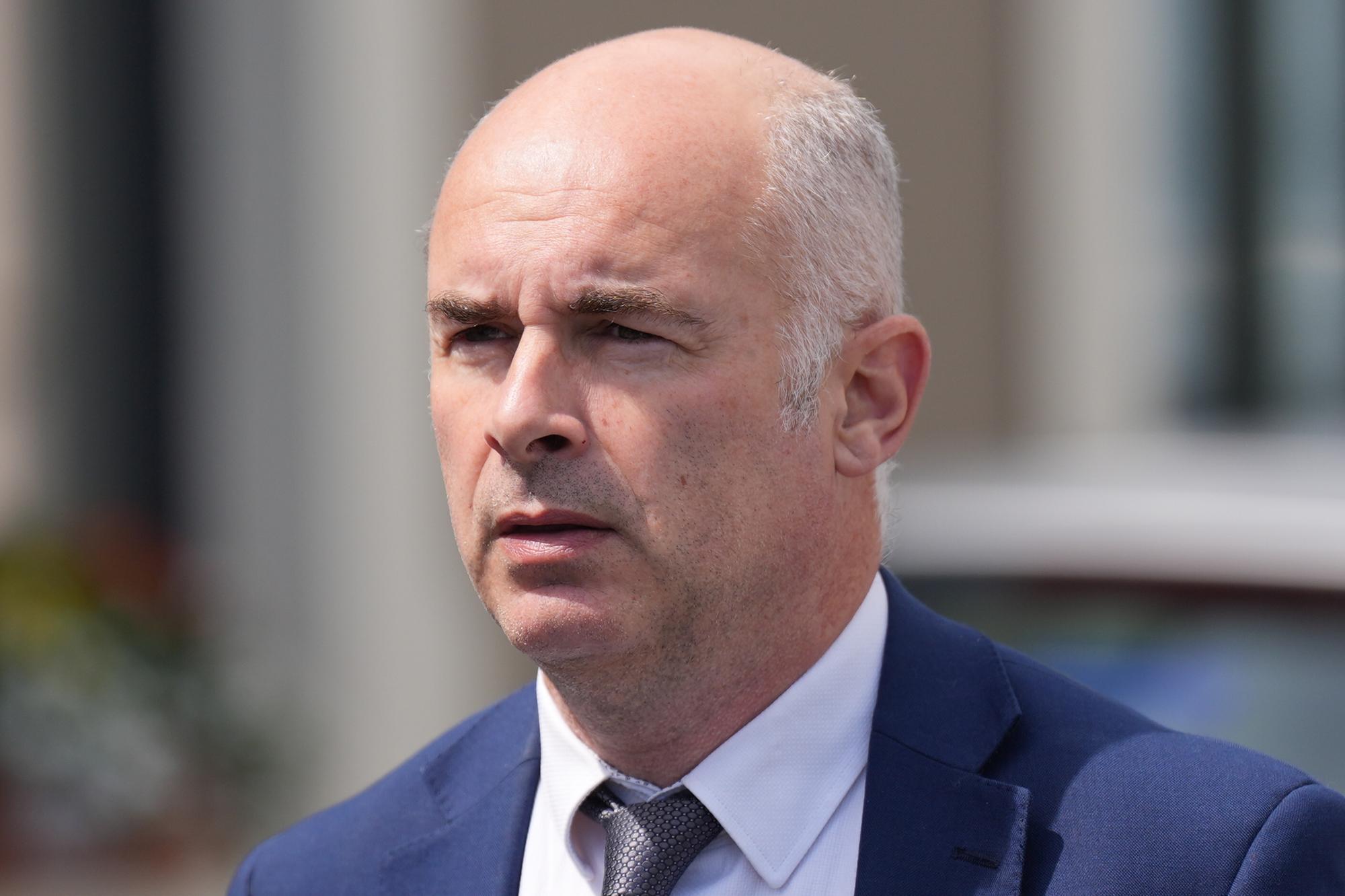 Office worker charged with hacking into confidential emails of MP Alex ...