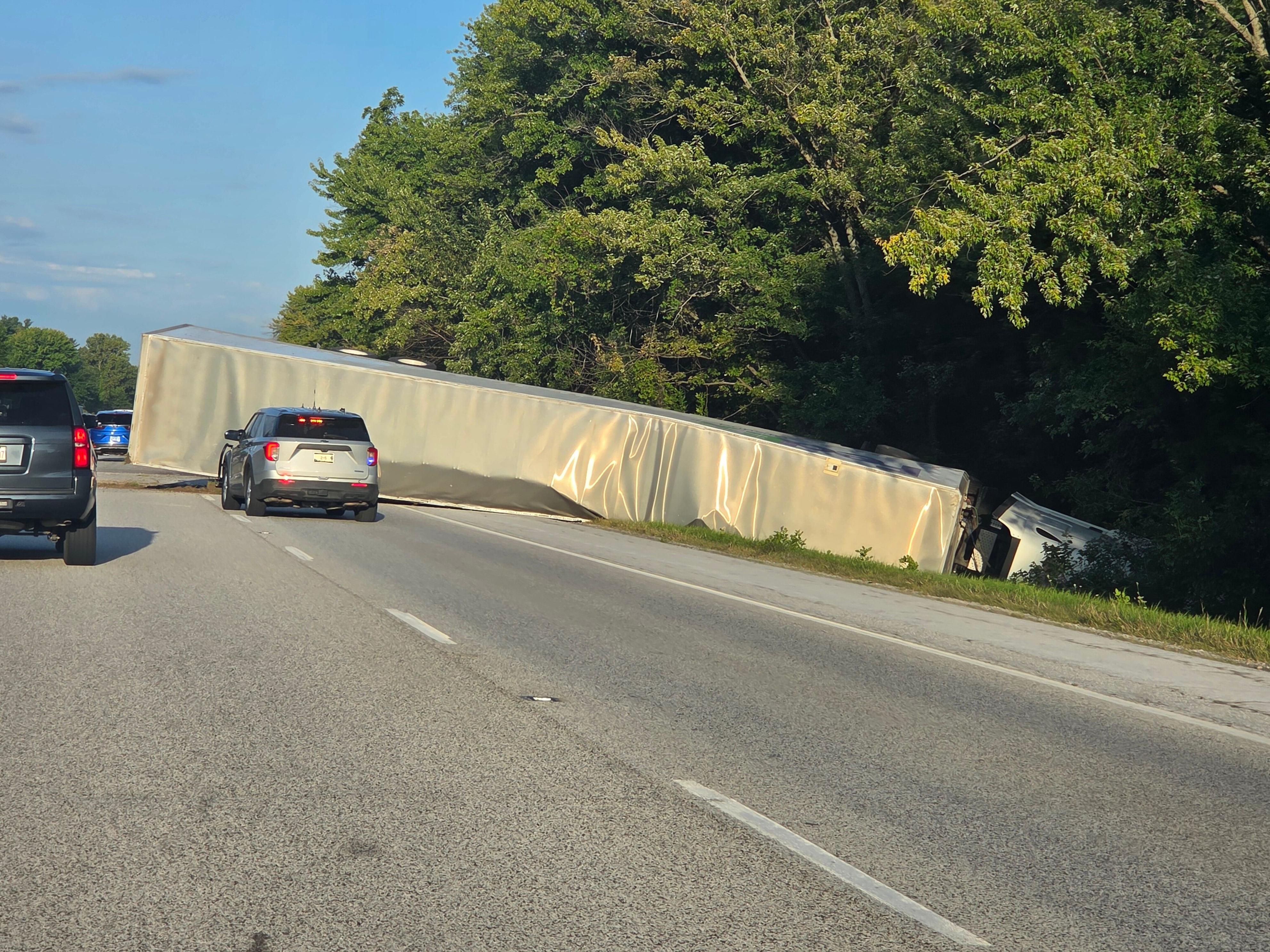 Car, semi-truck crash shuts down lane of I-74