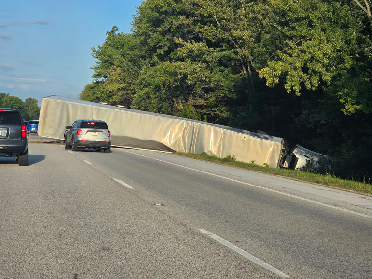 Car, semi-truck crash shuts down lane of I-74