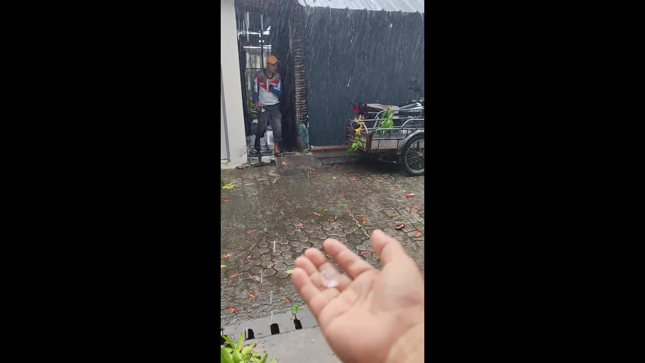 Residents in the Philippines stunned by hail storms lashing their homes