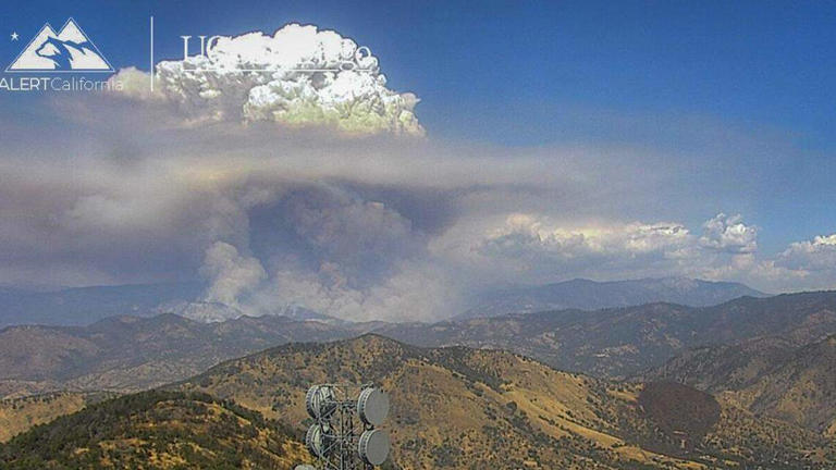 Garnet Fire continues to intensify with fire clouds appearing and no ...